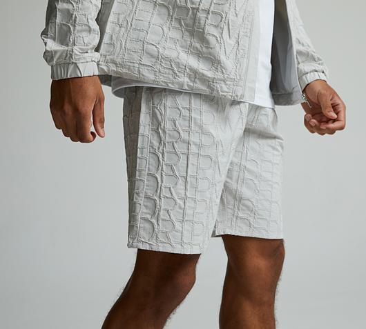 Dripmade Hoax Repeat Stitch Woven Short | Glacier Grey | Footasylum