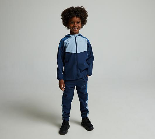 Monterrain Nursery Triton Woven Tracksuit | Dress Blues / Ensign Blue ...